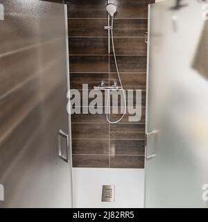 New shower cabin after renovation. Purity and freshness. Construction ...