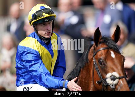 Desert Crown and jockey Richard Kingscote after winning The Al Basti ...