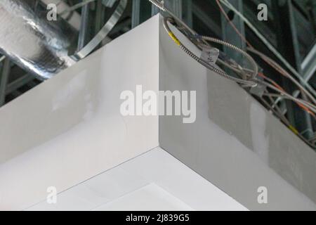 Overhead drywalled soffits in a commercial building. New Construction ...