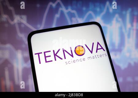 In this photo illustration, the Teknova logo seen displayed on a ...