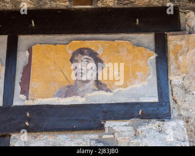 Painted head of a patron god, Taberna of the Four Deities, Via ...