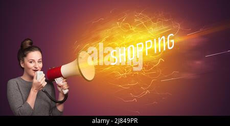 Young girld shouting in megaphone Stock Photo - Alamy