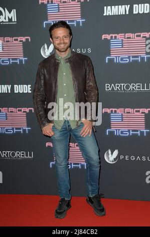 Marco Vivio attends the red carpet of the premiere of the movie America ...