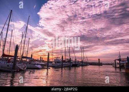 The wonderful and colorful port at sunset time Stock Photo - Alamy