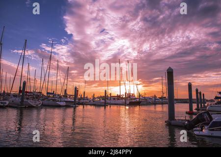 The wonderful and colorful port at sunset time Stock Photo - Alamy