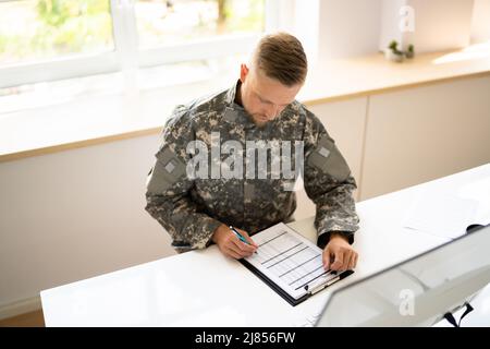 Military Student Education. Army Soldier Veteran With Computer Stock ...