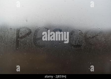 word peace on a foggy window Stock Photo - Alamy