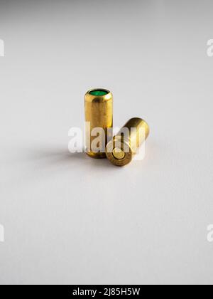 bullet cartridges casings on white background Stock Photo - Alamy