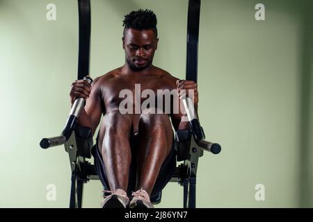 Male athletewith dreadlocks working out in the gym Stock Photo - Alamy