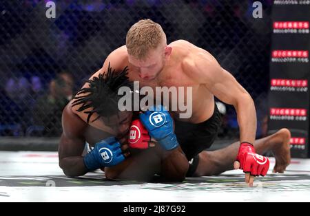 Luke Trainer (top) and Simon Biyong in action during the light ...