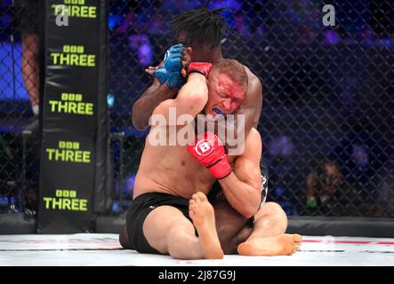 Luke Trainer (top) and Simon Biyong in action during the light ...