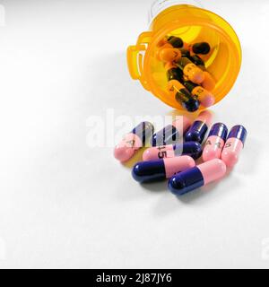 Vial of pink medication Stock Photo - Alamy