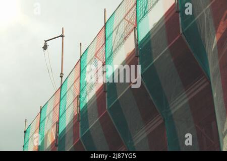 Work in progress with the Italian flag Stock Photo - Alamy