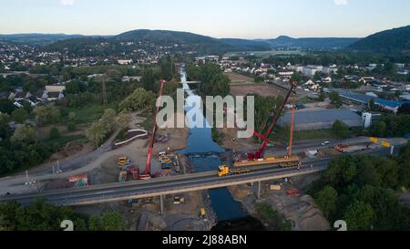 Sinzig, Germany. 14th May, 2022. Two truck-mounted cranes have begun ...
