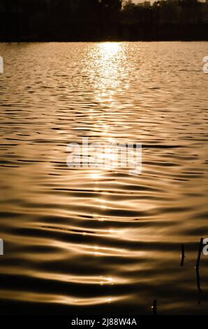 Beautiful water at a lake with splashing water and ripples on the ...