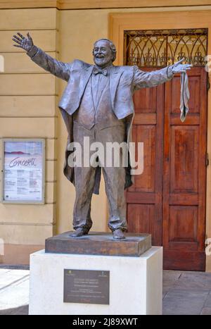 Statue of Luciano Pavarotti, the legendary Italian opera tenor, in ...