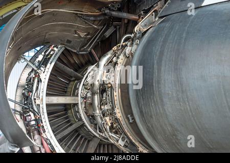 Turbine Disassembled jet aircraft engine undergoing scheduled repair of ...