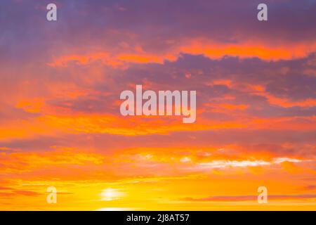 Beautiful bright sunset with multicolored evening glowing over skyline ...
