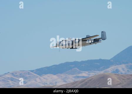 A Mitchell B-25 bomber performs a fly-by during the air show rehearsal ...