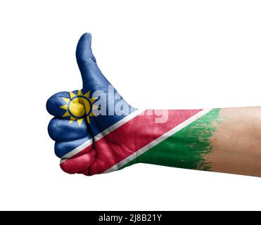 Hand making victory sign, namibia painted with flag as symbol of ...