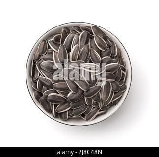 Bowl of black sunflower seeds, closeup Stock Photo - Alamy