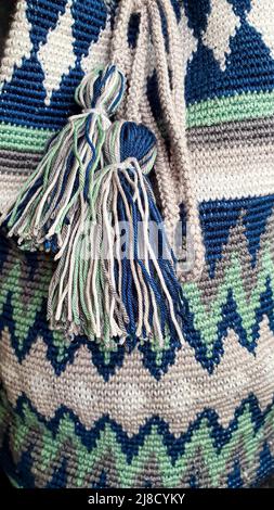 Handmade bags. Knitted from colored threads. Volumetric and comfortable ...