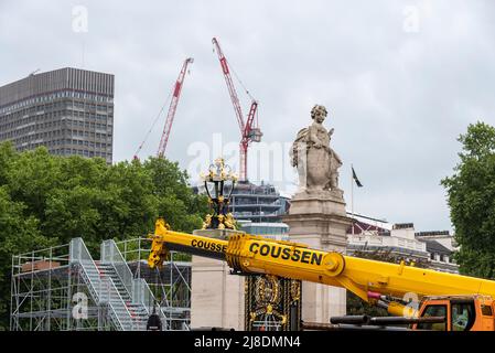 Grandstand construction in progress outside Buckingham Palace, London ...