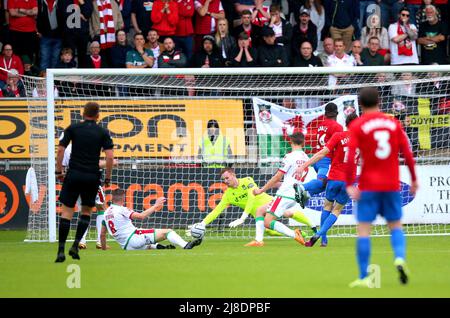 Wrexham goalkeeper Christian Dibble makes a save during the Vanarama ...