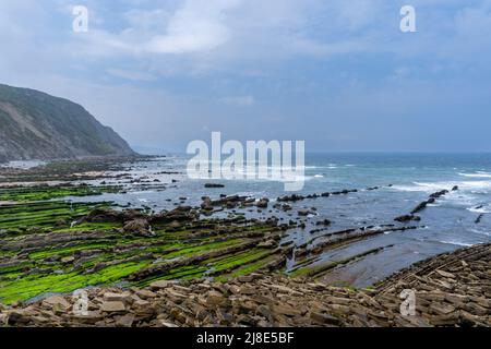 flysch rocks in barrika beach at the sunset Stock Photo - Alamy