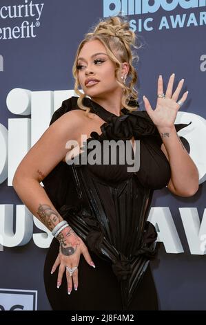 Latto walking on the red carpet at the 2022 Billboard Music Awards at ...