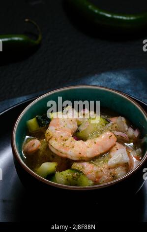 Aguachile, Mexican spicy marinated seafood dish with shrimp Stock Photo ...