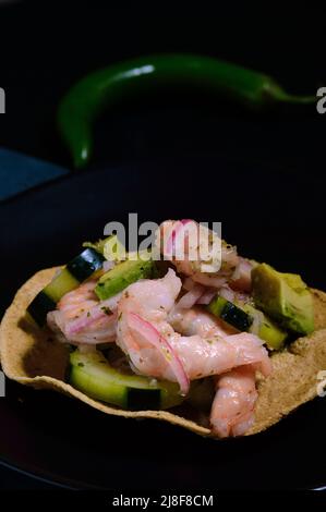 Aguachile, Mexican spicy marinated seafood dish with shrimp Stock Photo ...