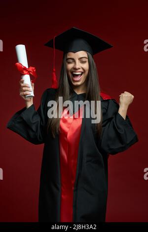Front view of glad girl with bachelor, master degree holding diploma ...