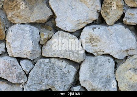 Weathered limestone wall texture with natural stone detail Stock Photo ...