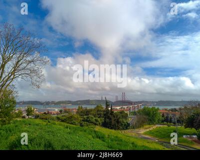 The 25th of april above the tagus river located in the capital city of ...