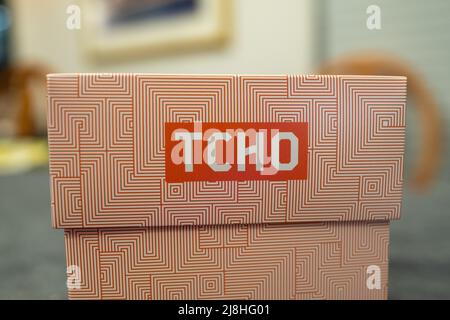 Close-up of logo for TCHO chocolate on chocolate bar against white ...