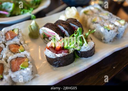 Plate with multiple sushi rolls at Blue Gingko restaurant in Lafayette ...