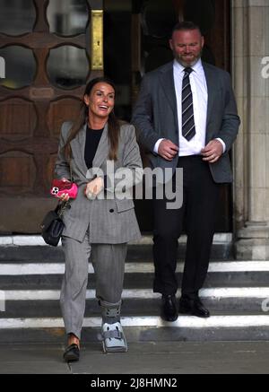 Coleen and Wayne Rooney leaving the Royal Courts Of Justice, London, as ...