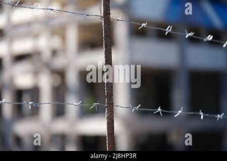 Security barbedwire fence, wire with clusters of short, sharp spikes ...