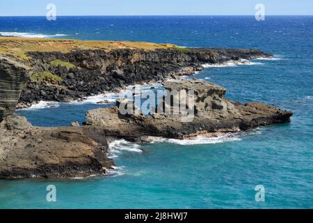 Mahana beach in Hawaii, one of only four green sand beaches of the ...
