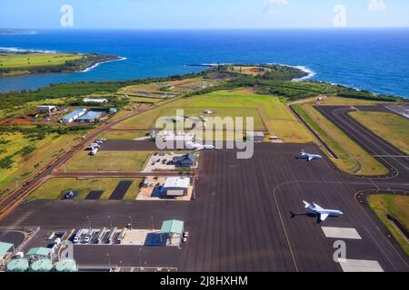 Aerial view of the runway and plane hangars of Lihue airport on Kauai ...