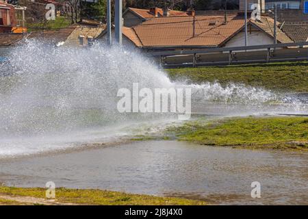 Broken Fire Hydrant Spraying Water at Streets and Park Floods Stock ...
