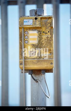 Old Yellow BT Emergency Phone outside the Barking Reach Power station ...