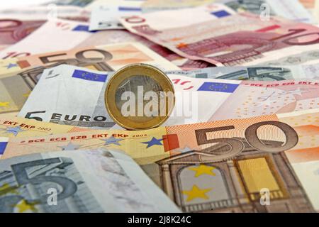 different Euro bills and a 1 Euro coin Stock Photo - Alamy