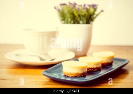 Small round homemade cheesecakes served with tea for a snack Stock ...