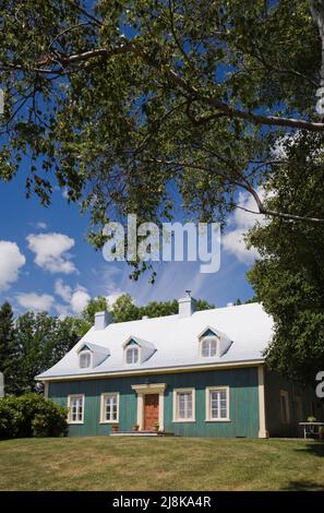 Old circa 1786 Canadiana cottage style fieldstone home facade with red ...