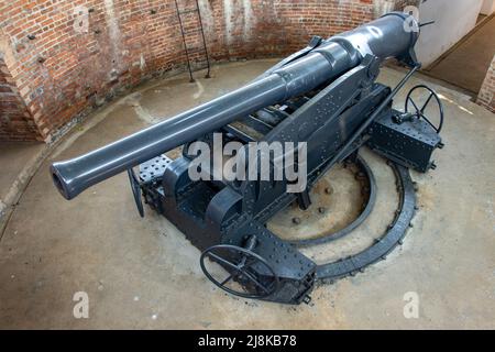 A large cannon (Armstrong cannon) inside a hidden building for coastal ...
