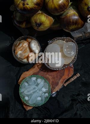 Sliced fresh toddy palm in fresh toddy palm juice with crushed ice ...