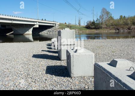 Cement Block Barriers at River Park - Overpass Stock Photo - Alamy