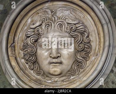 bas-relief of the female head of the Gorgon Medusa on the sarcophagus ...